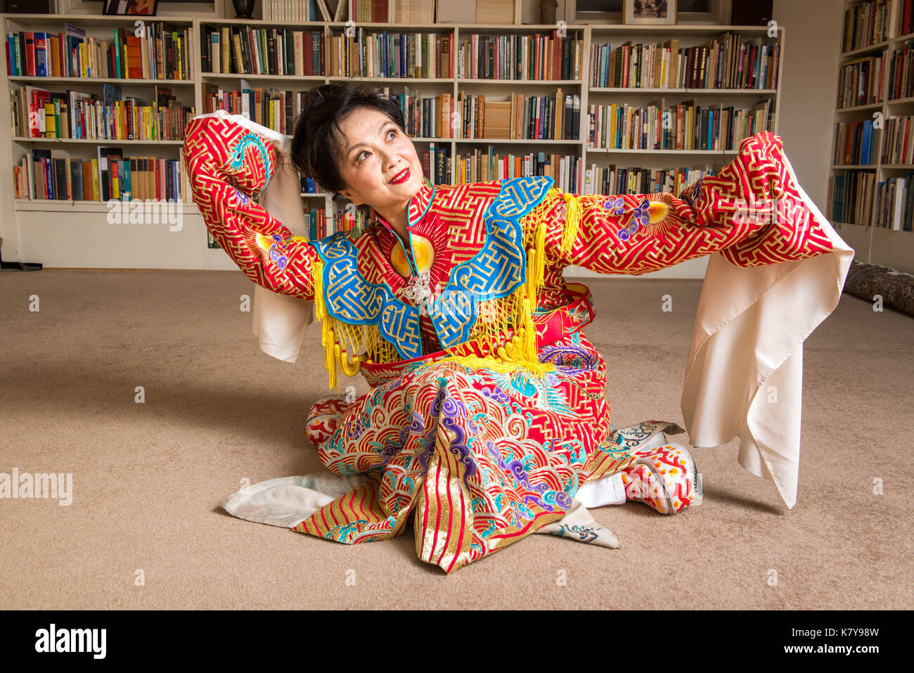 Beijing opera singer showcases beautiful costume Stock Photo - Alamy