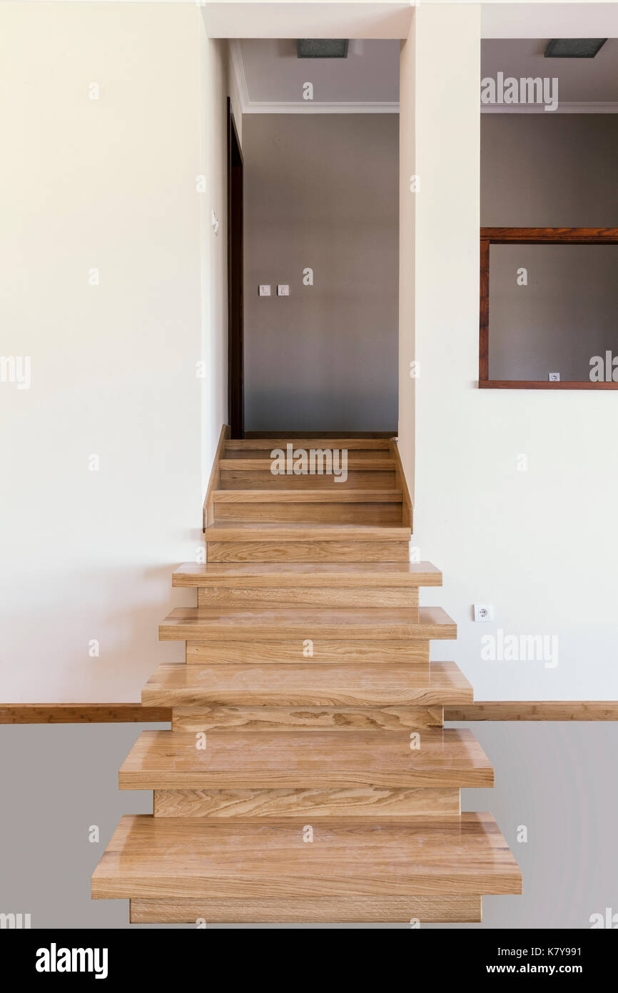 wooden stairs leading to the upper floor Stock Photo - Alamy