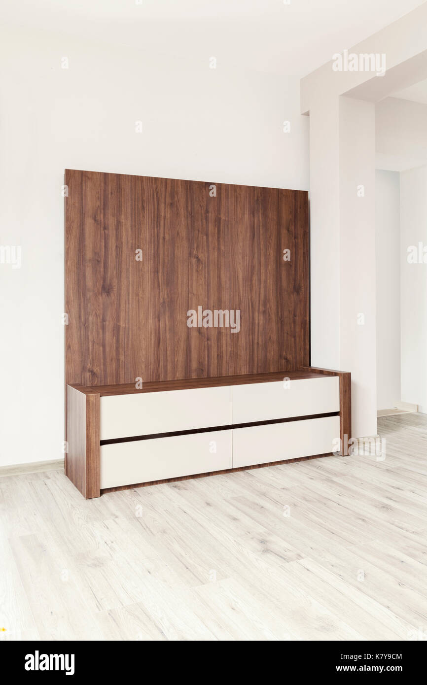 wooden shelves for TV in an empty room Stock Photo - Alamy