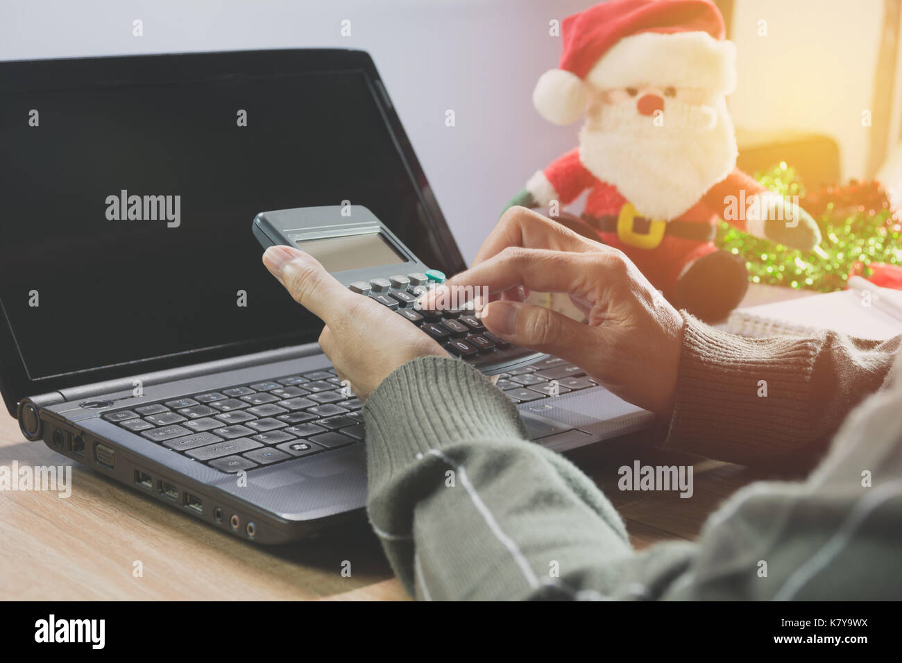 Female using calculator hi-res stock photography and images - Alamy