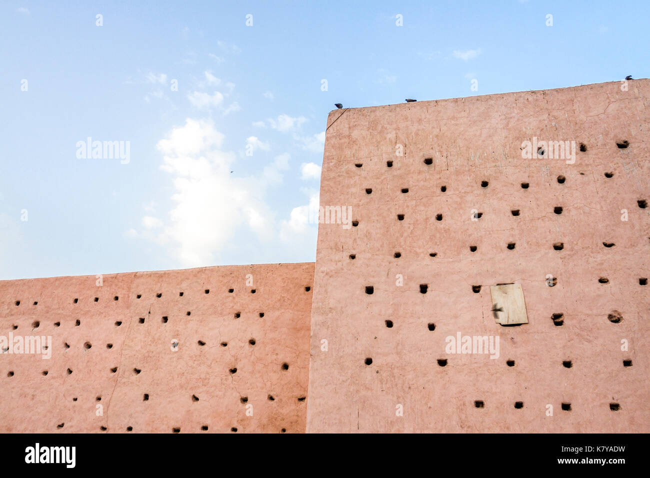 Red city walls of medina at sunset. Marrakech, Marrakech-Safi. Morocco ...