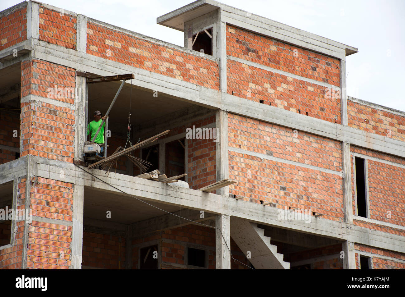 Asian thai workers and local machinery working builder new building at ...