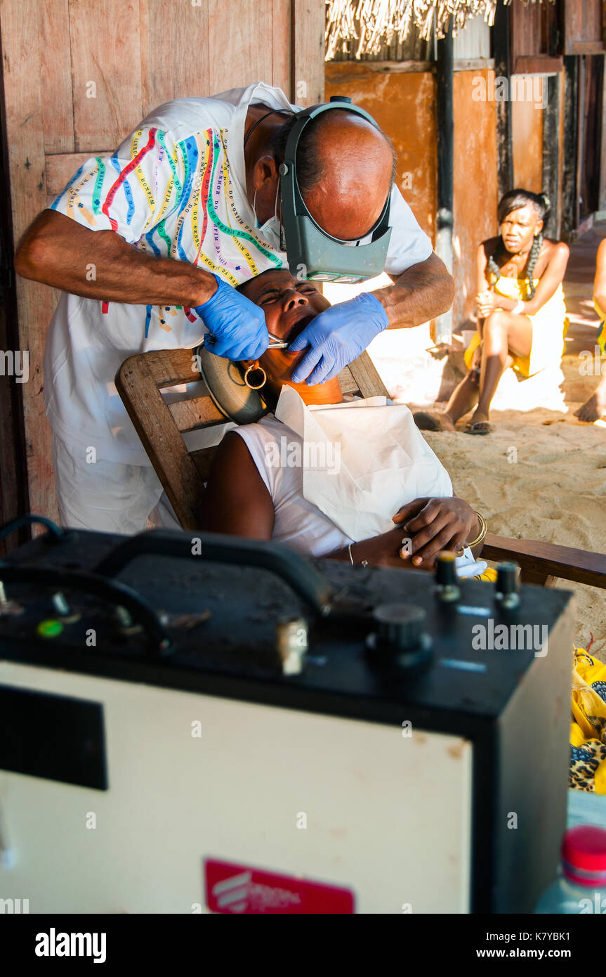 Volunteer Italian dentist at work with local Malagasy patients on his ...
