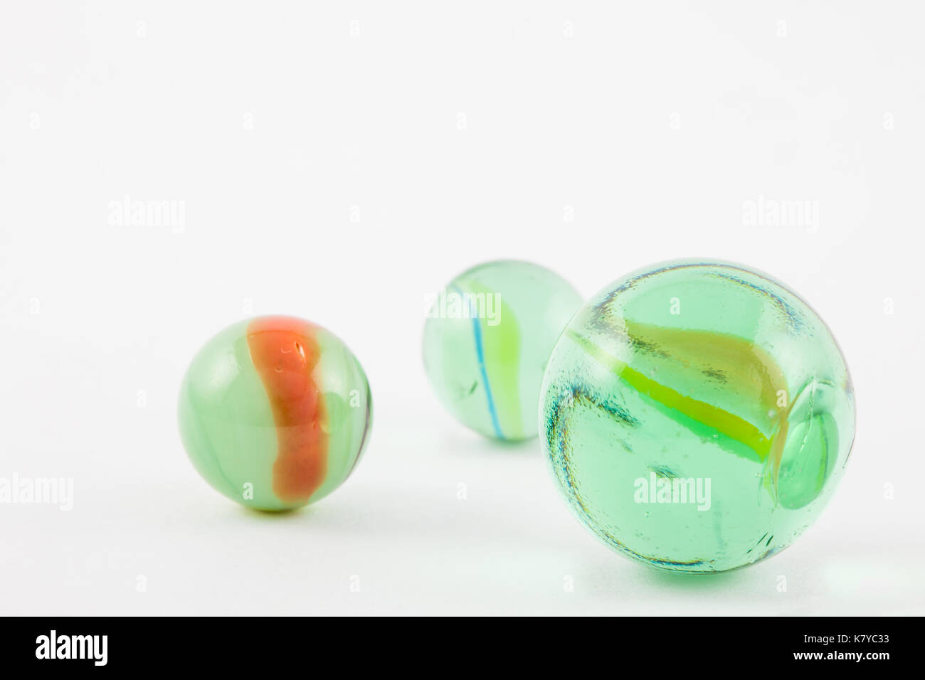 Glass marble balls isolated on white background Stock Photo - Alamy