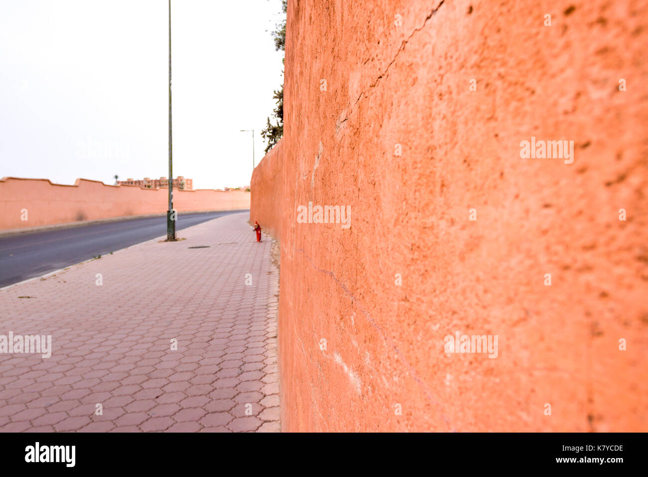 Red city walls of medina at sunset. Marrakech, Marrakech-Safi. Morocco ...