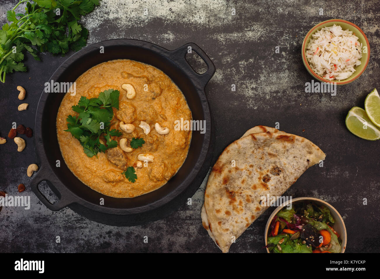 Mutton Korma, Indian curry meal with nuts, rice and peshwari naan, top ...