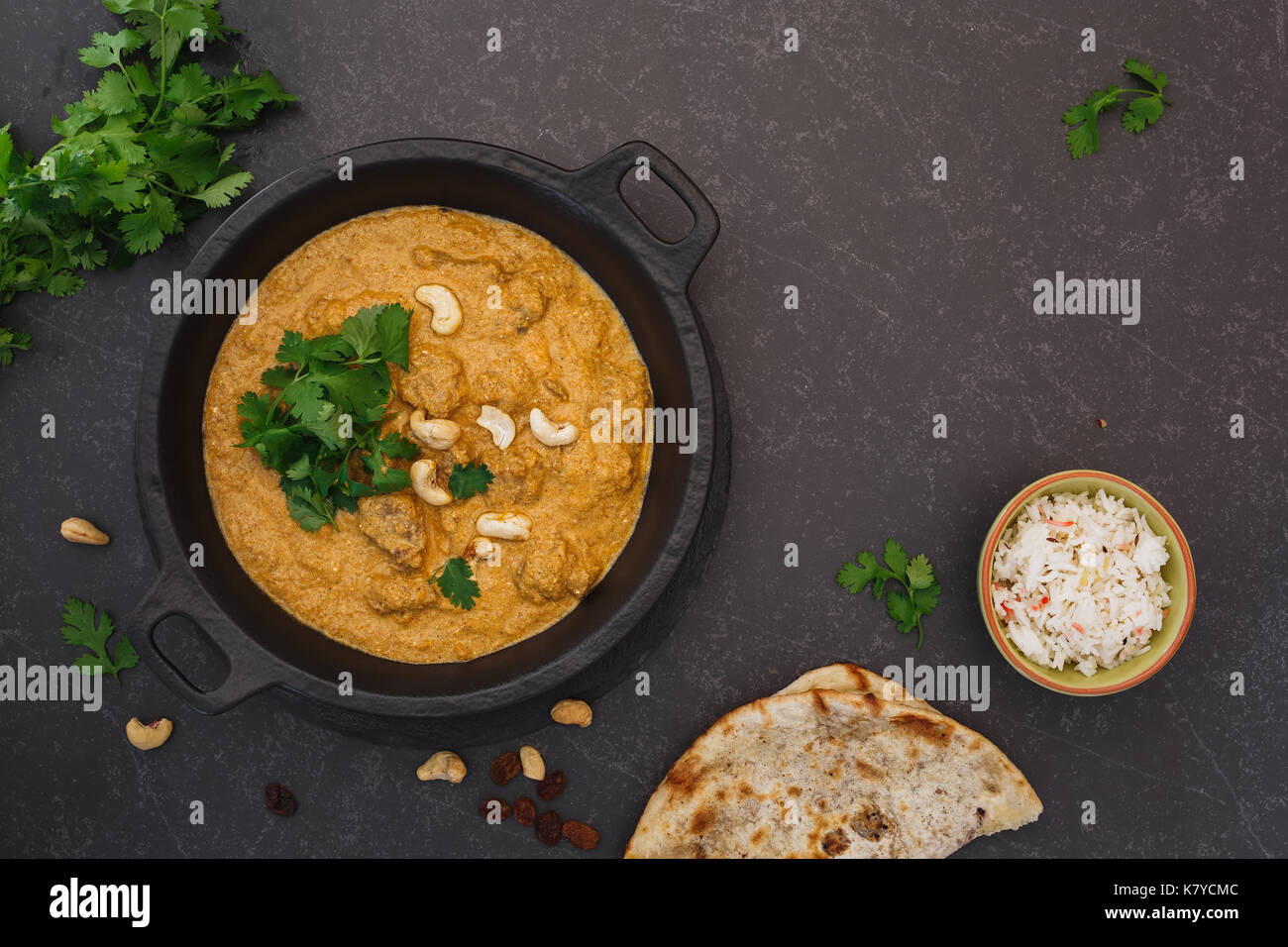 Mutton Korma, Indian curry meal with nuts, rice and peshwari naan, top ...