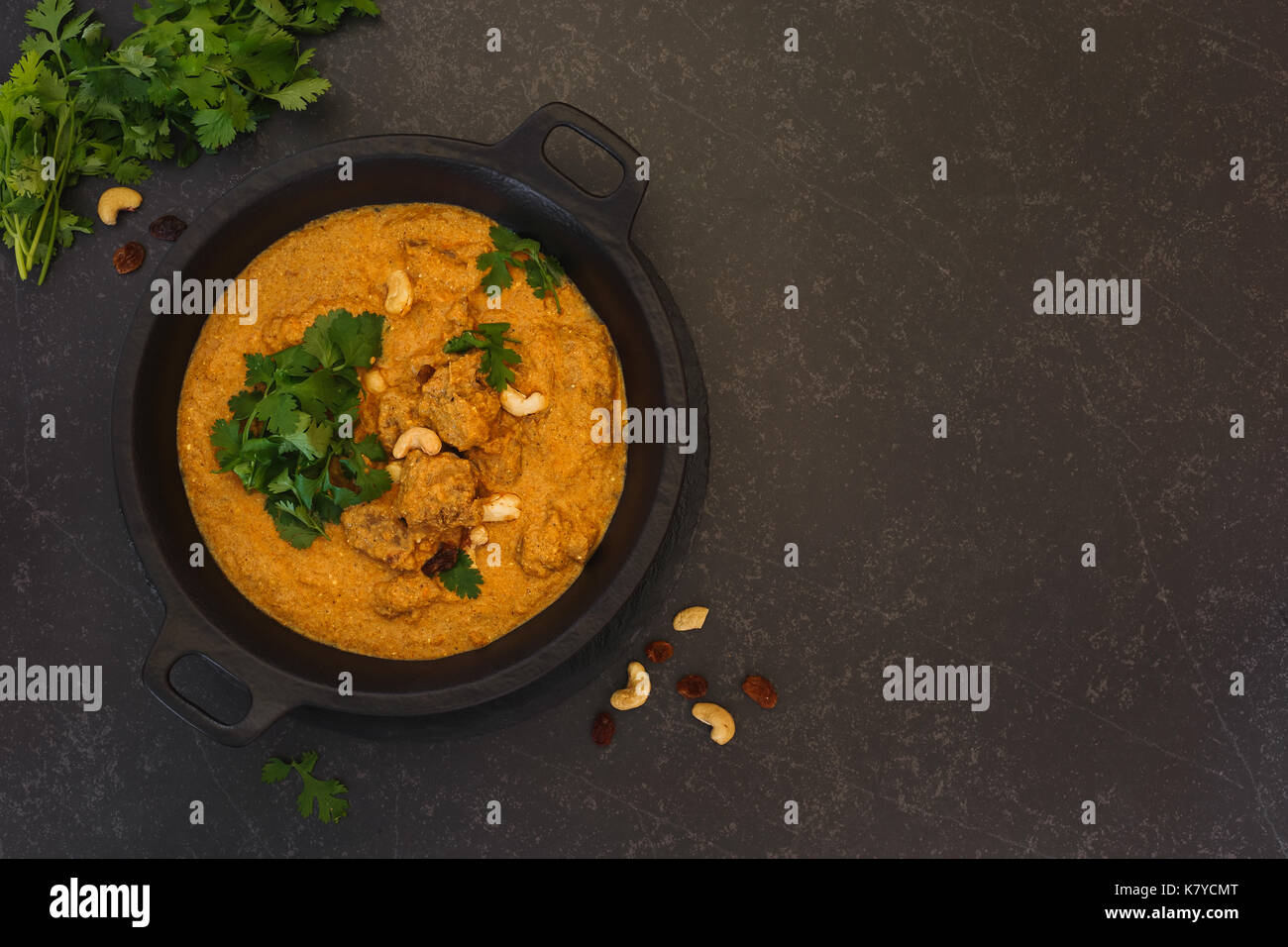 Mutton Korma, Indian curry meal with nuts, rice and peshwari naan, top ...
