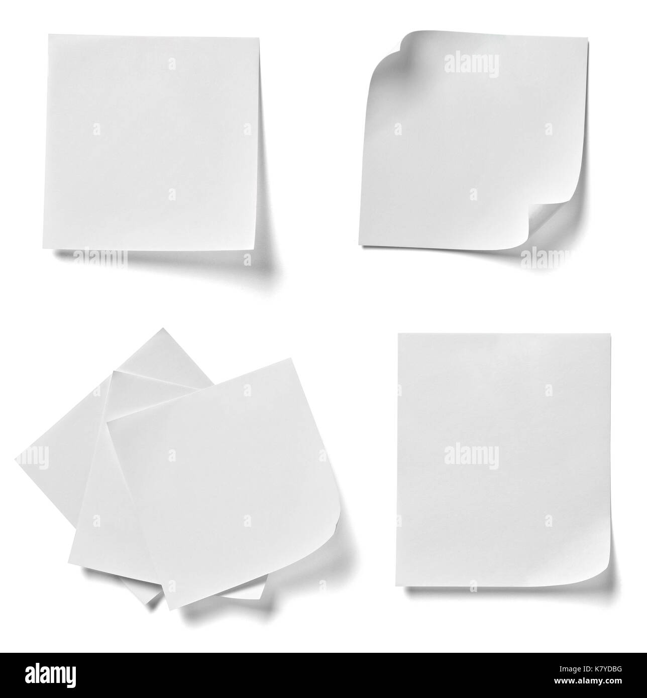 collection of various note papers on white background. each one is shot ...