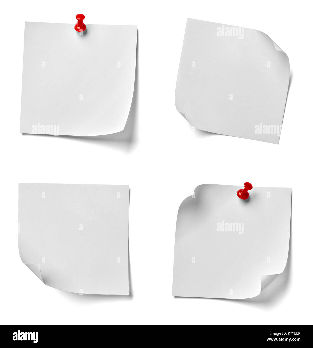 collection of various note paper with a red push pin on white ...
