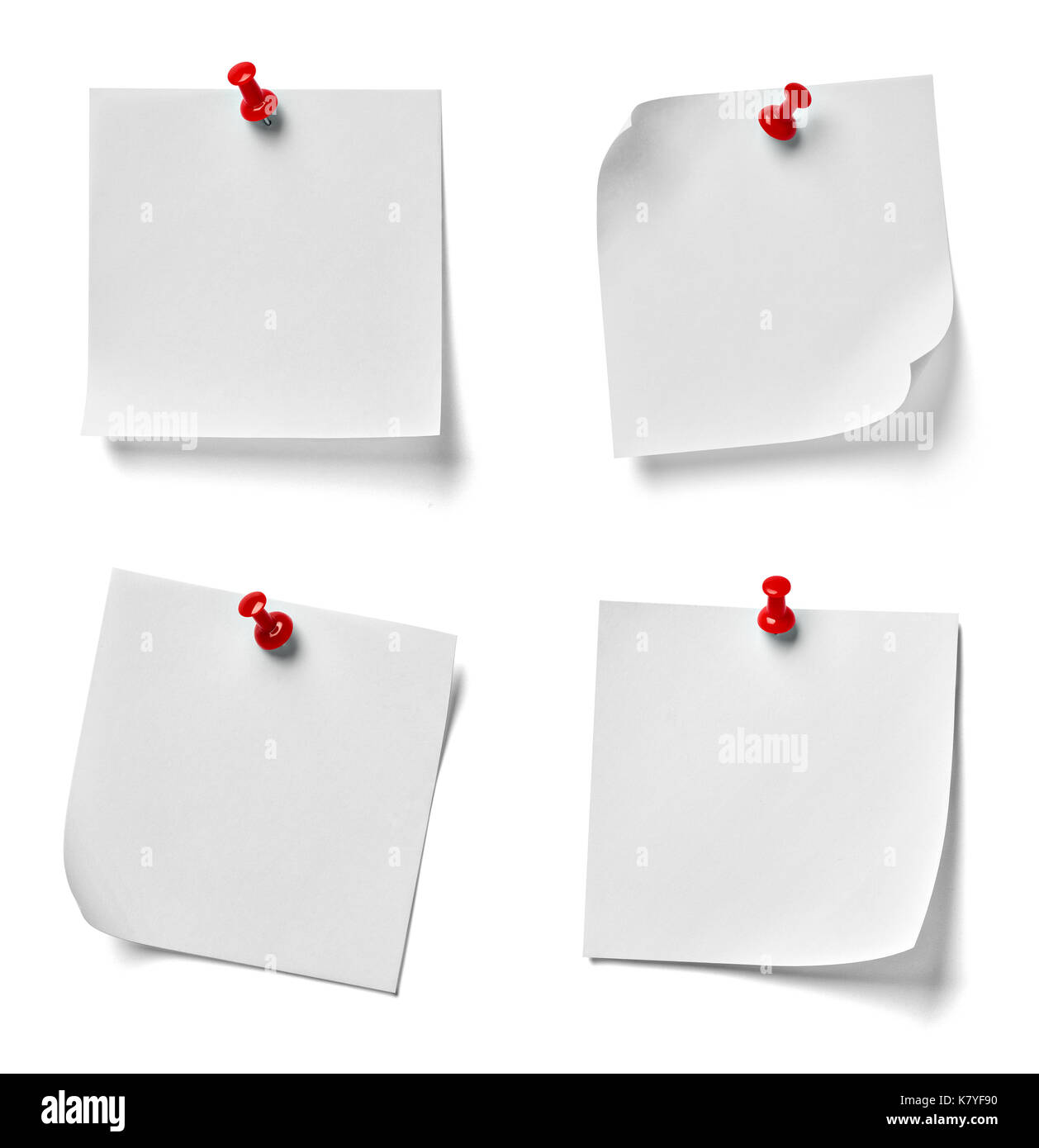 collection of various note paper with a red push pin on white ...