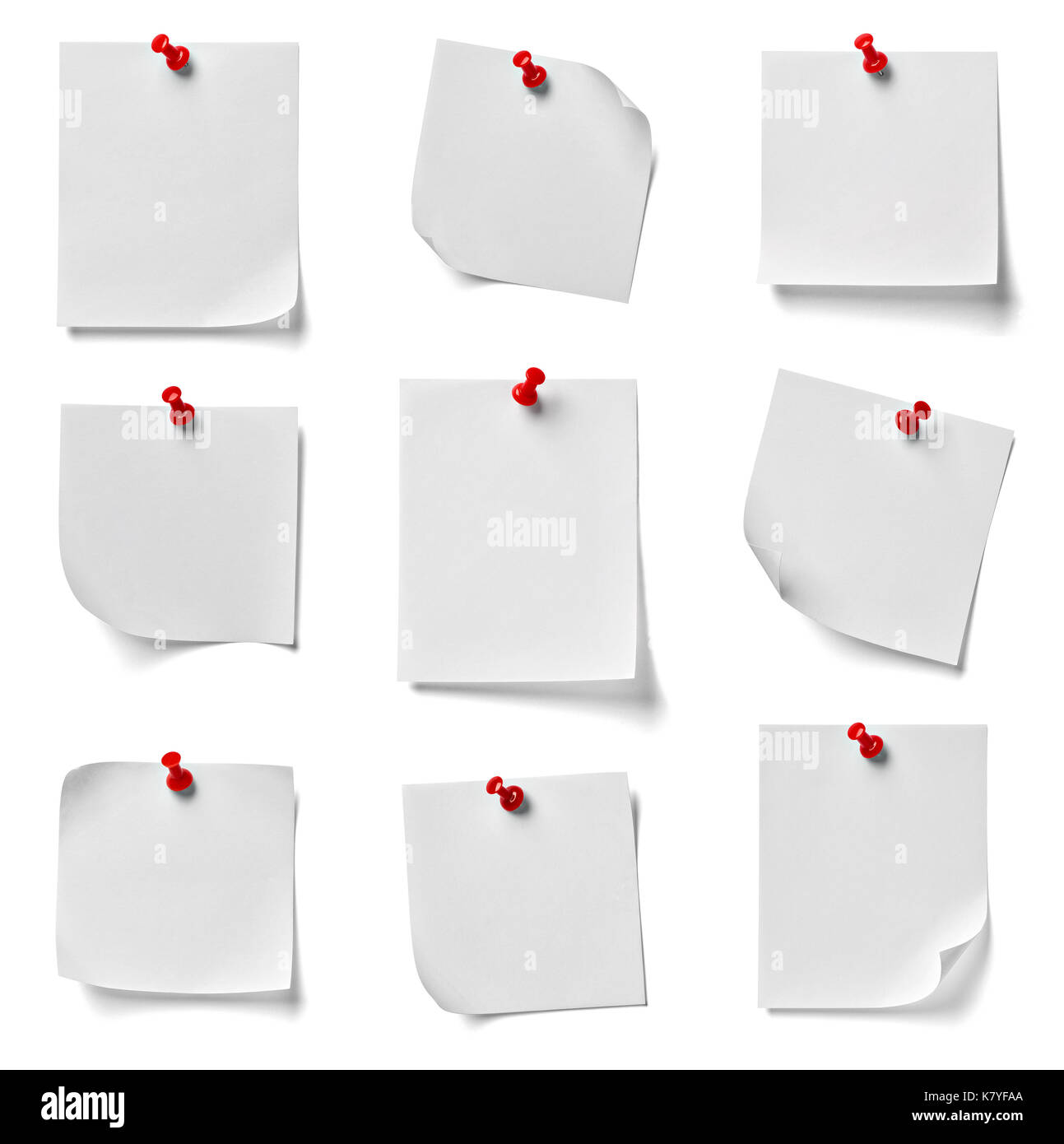 collection of various note paper with a red push pin on white ...