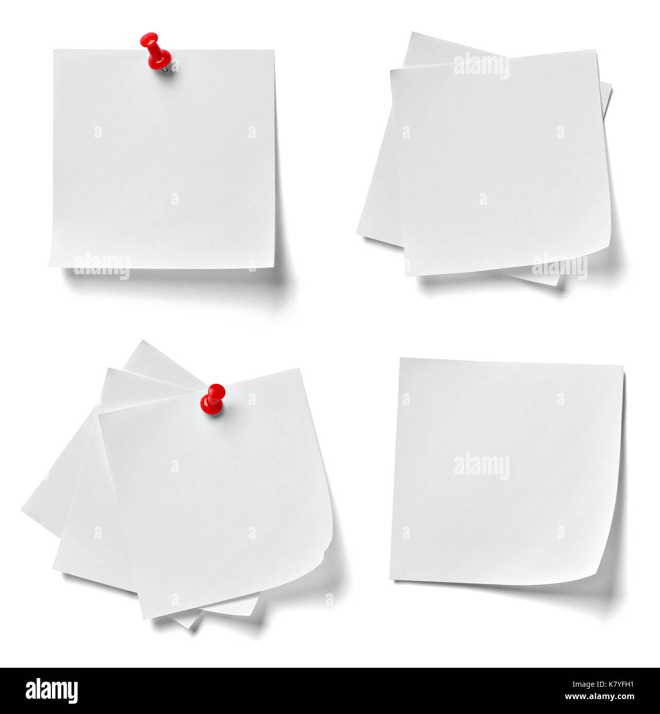 collection of various note paper with a red push pin on white ...