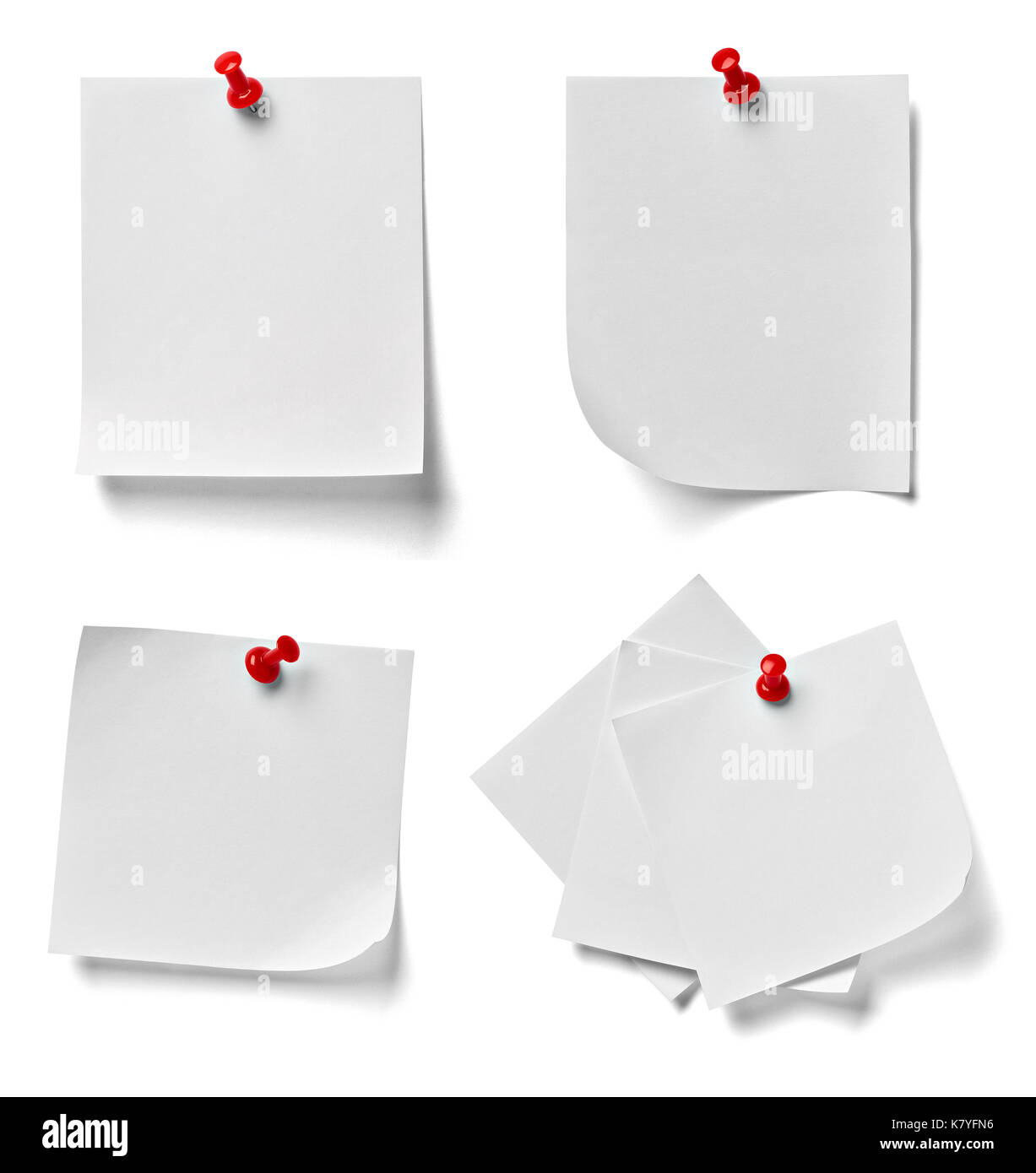 collection of various note paper with a red push pin on white ...