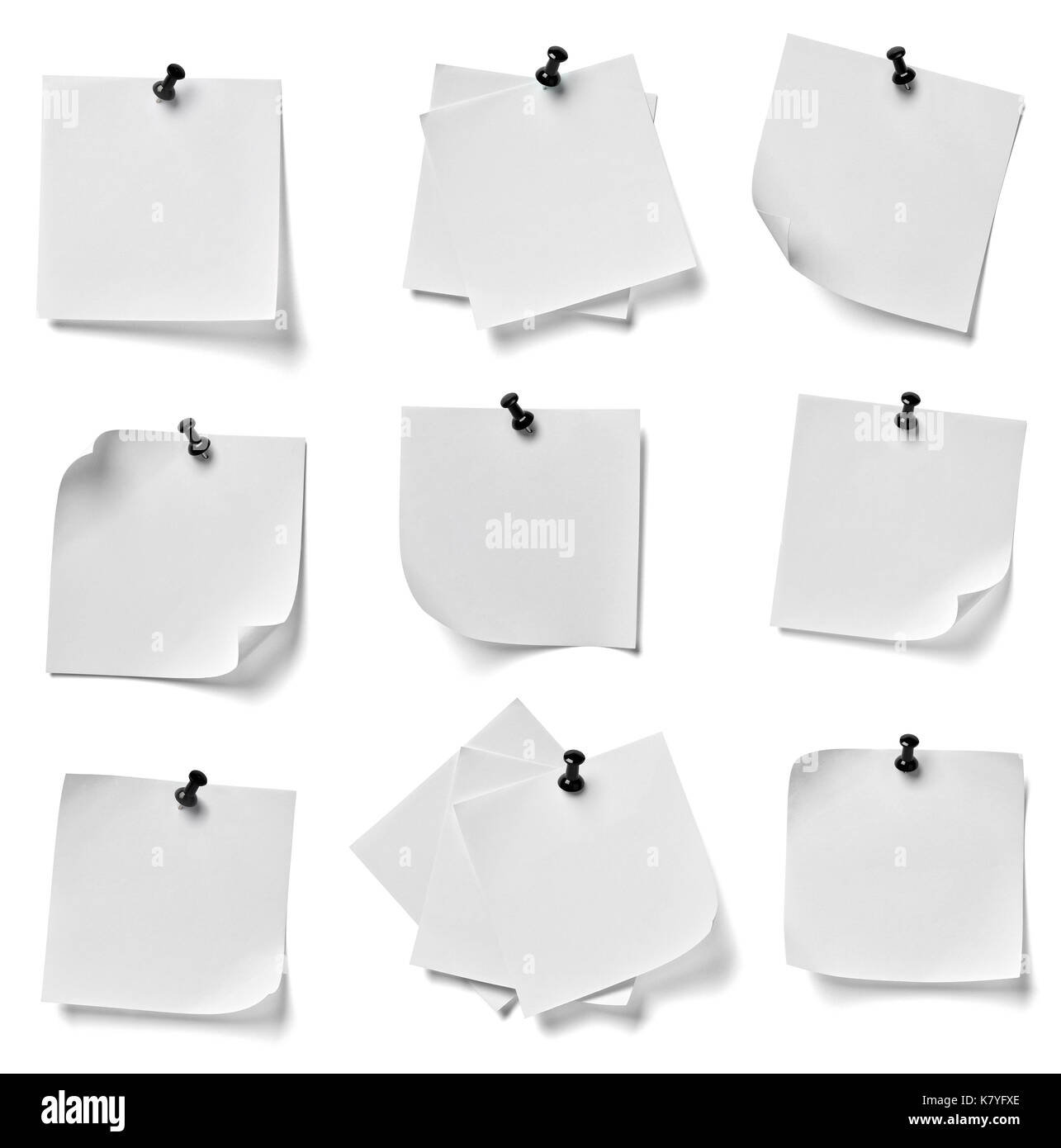 collection of various note paper with a red push pin on white ...