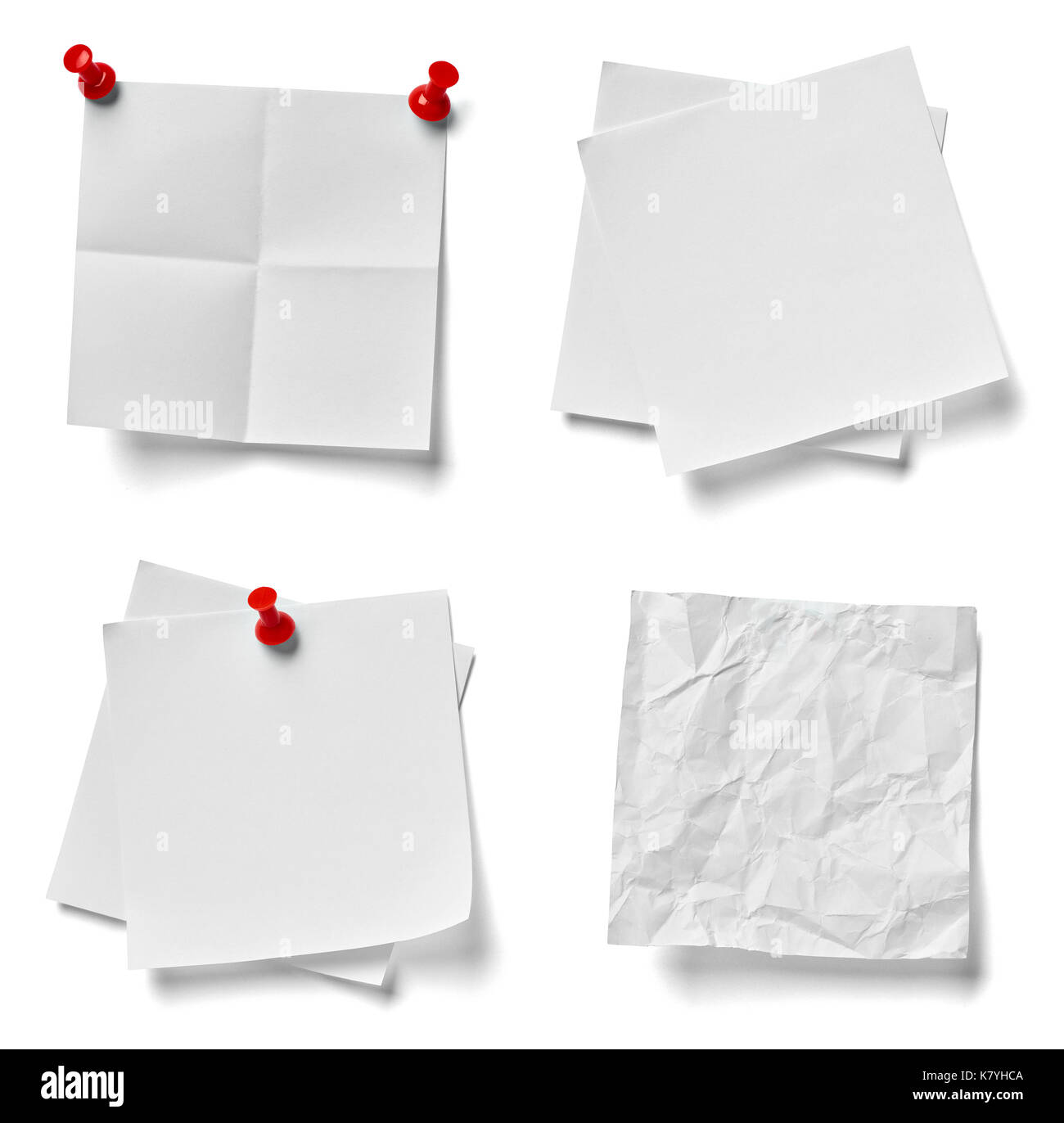 collection of various note paper with a red push pin on white ...