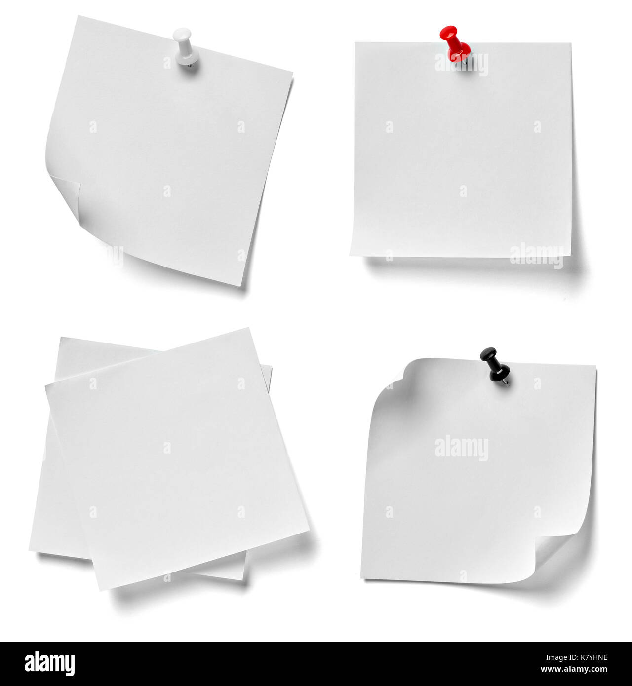 collection of various note paper with a red push pin on white ...