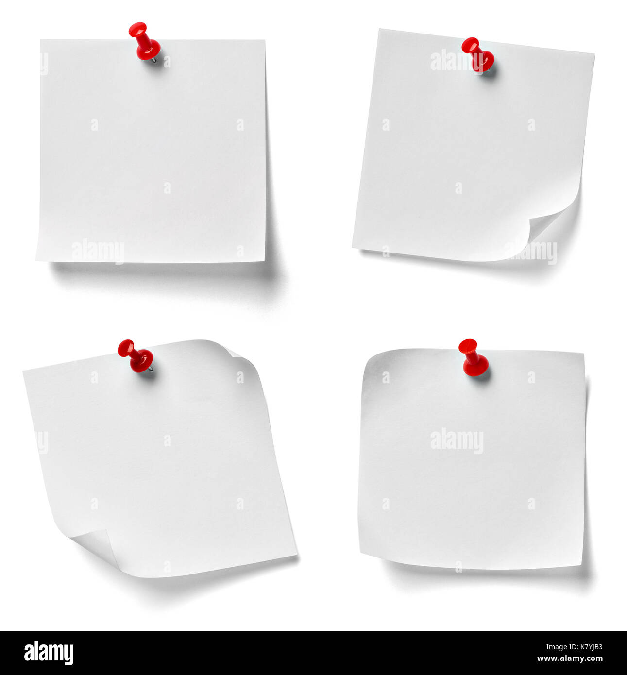 collection of various note paper with a red push pin on white ...