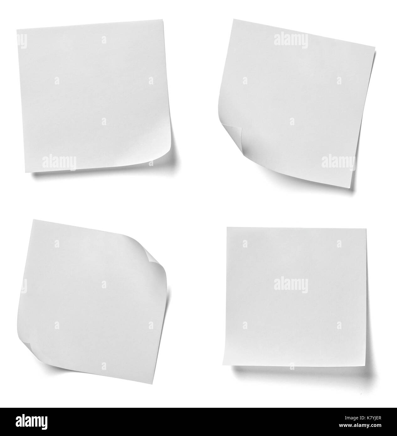 collection of various note papers on white background. each one is shot ...