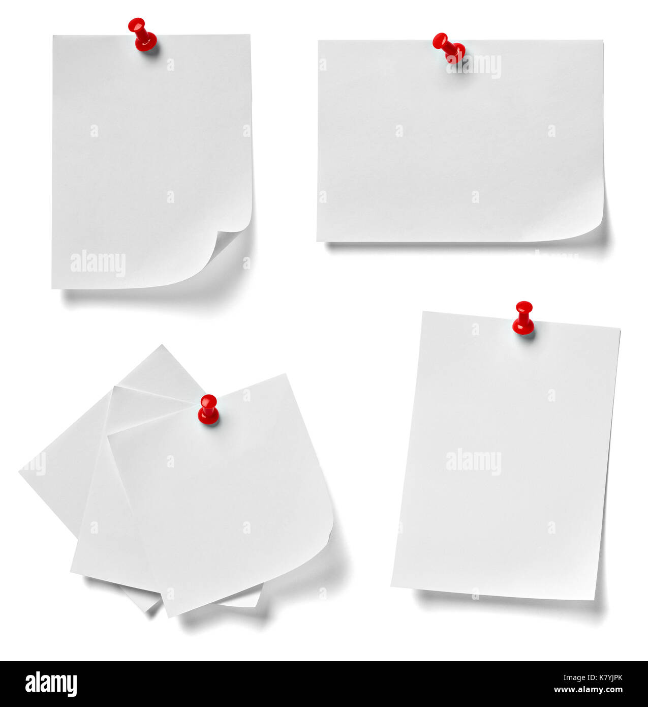 collection of various note paper with a red push pin on white ...