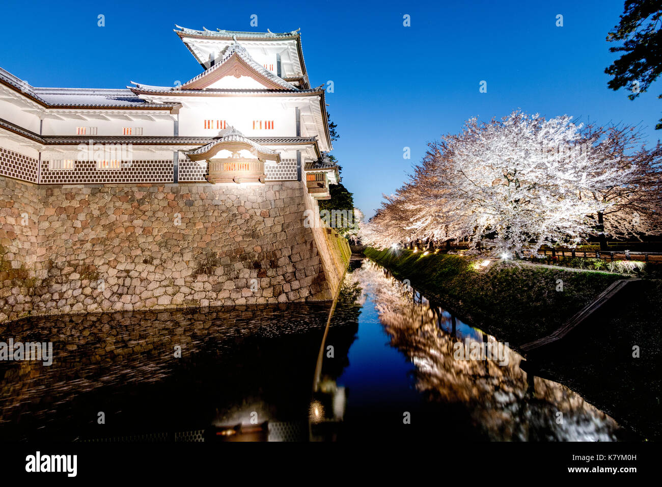 Kanazawa castle, Japan. Night time. Inner moat and Hishi yagura, turret ...
