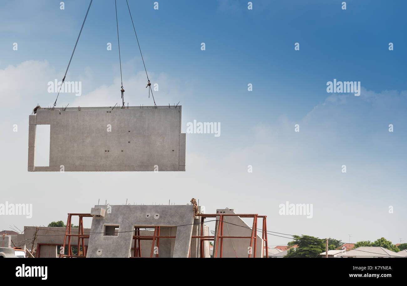 Construction crane lifting precast concrete hi-res stock photography ...