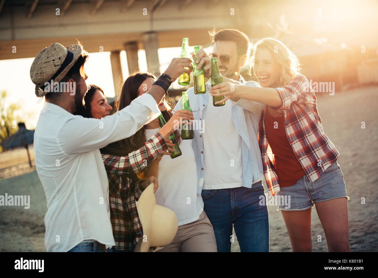 Group people partying tropical beach hi-res stock photography and ...