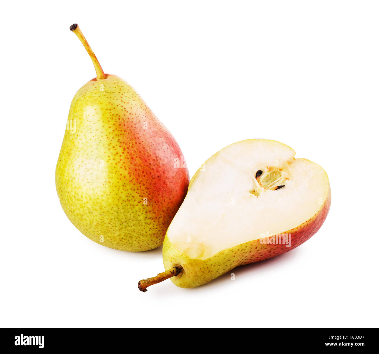 One and a half green and red pears fruit isolated on white background ...