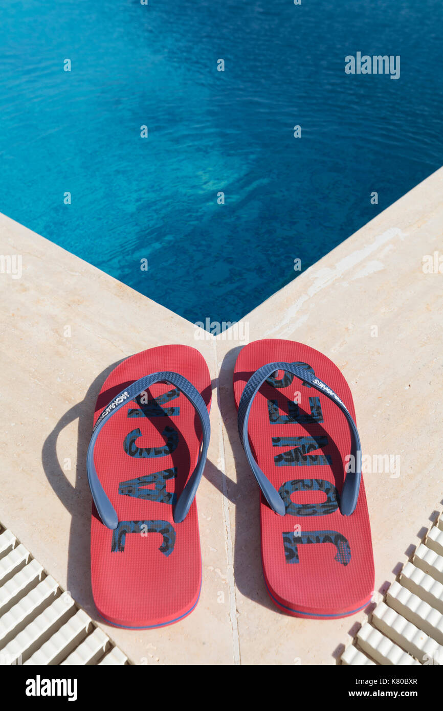 Flip Flops By Side of Pool Stock Photo - Alamy