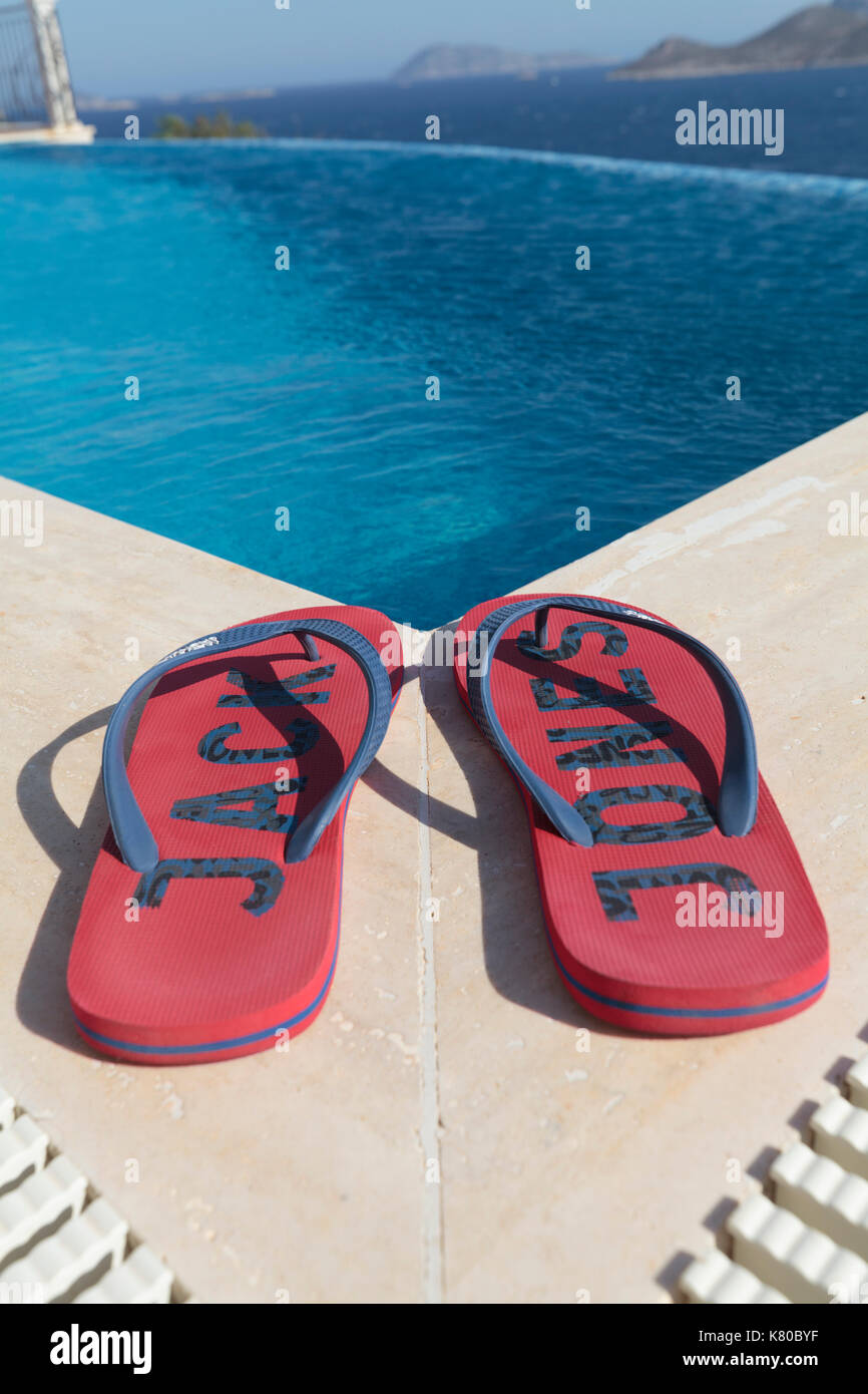 Flip Flops By Side of Pool Stock Photo - Alamy