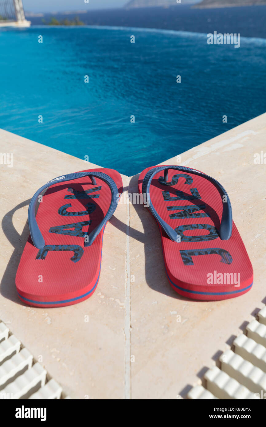 Flip Flops By Side of Pool Stock Photo - Alamy