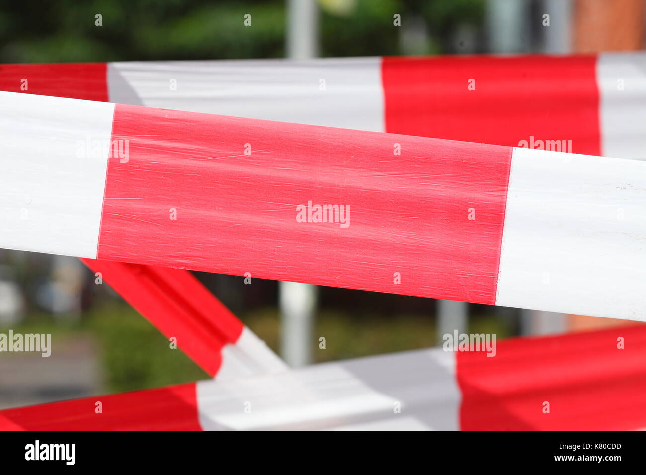 red-white Construction site barrier tape Stock Photo - Alamy