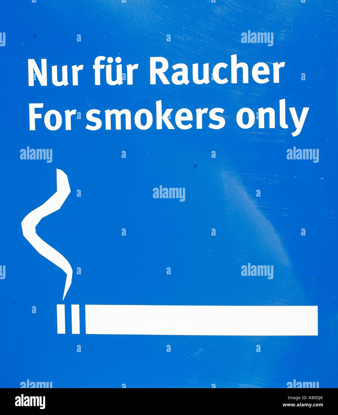 blue sign for smokers only Stock Photo - Alamy