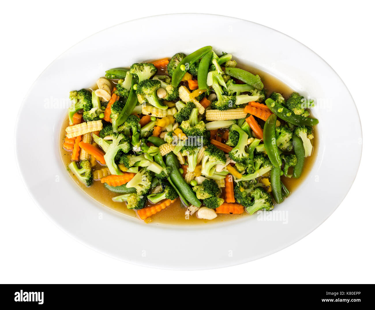 Plate of stir fried vegetables - isolated on white background. Studio ...