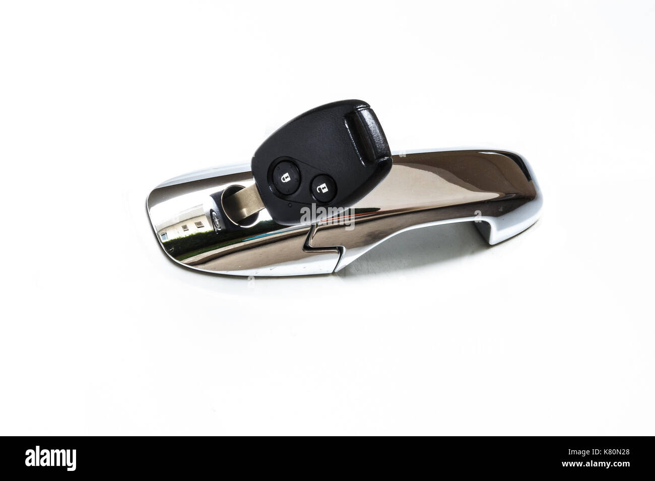 Car key in the car door hole Stock Photo - Alamy