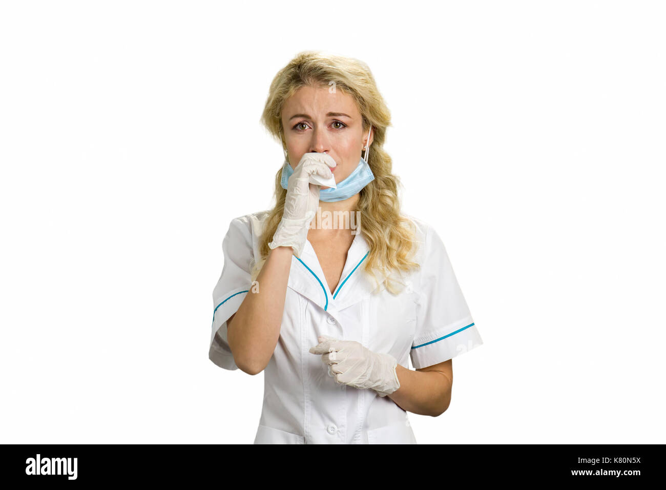 Portrait of young crying nurse Stock Photo - Alamy