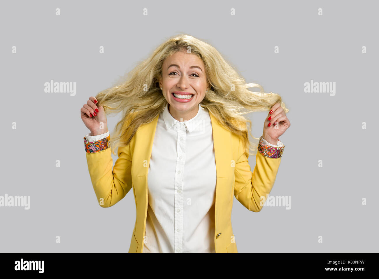 Elated young woman hi-res stock photography and images - Alamy