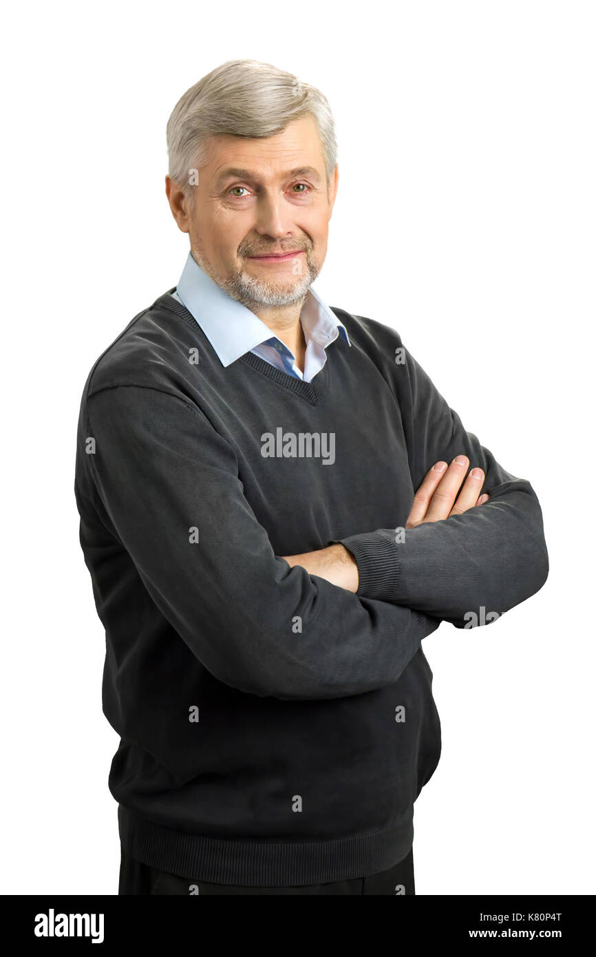 Portrait of elderly man with crossed hands Stock Photo - Alamy