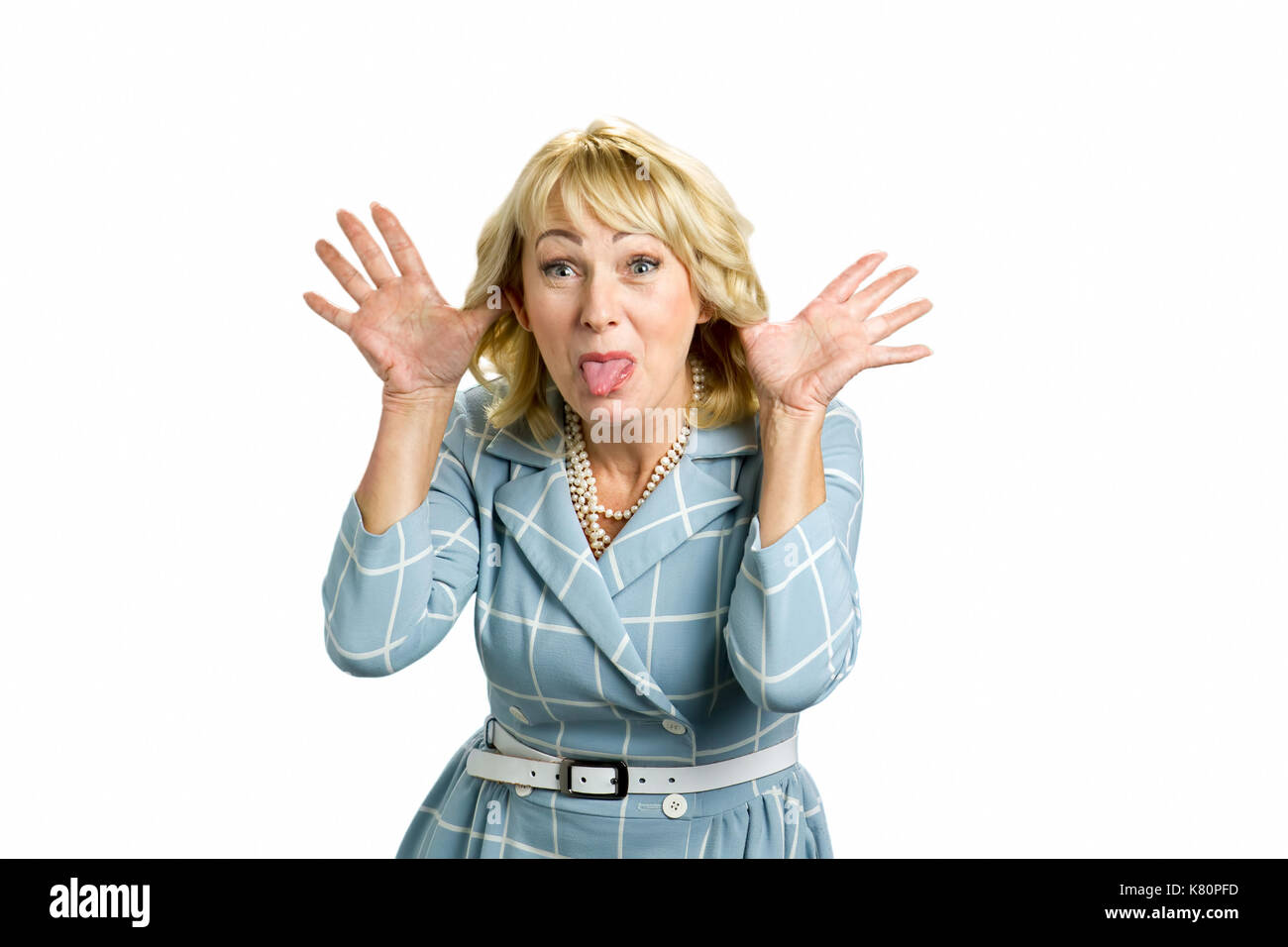 Adult woman making grimace Stock Photo - Alamy