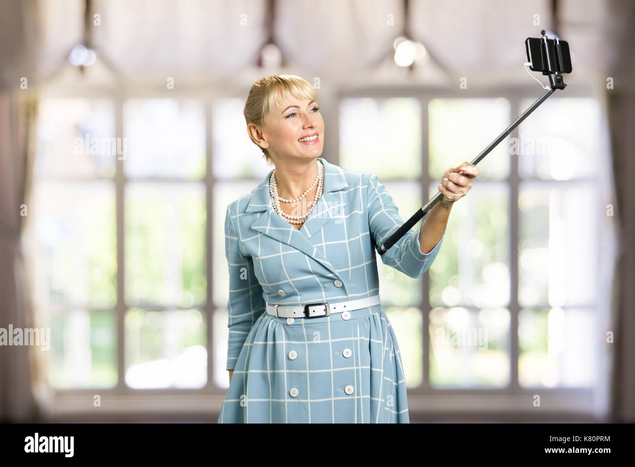 Mature professional smiling taking hi-res stock photography and images ...