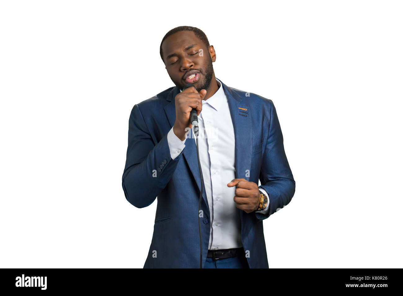 Afro singer with closed eyes Stock Photo - Alamy