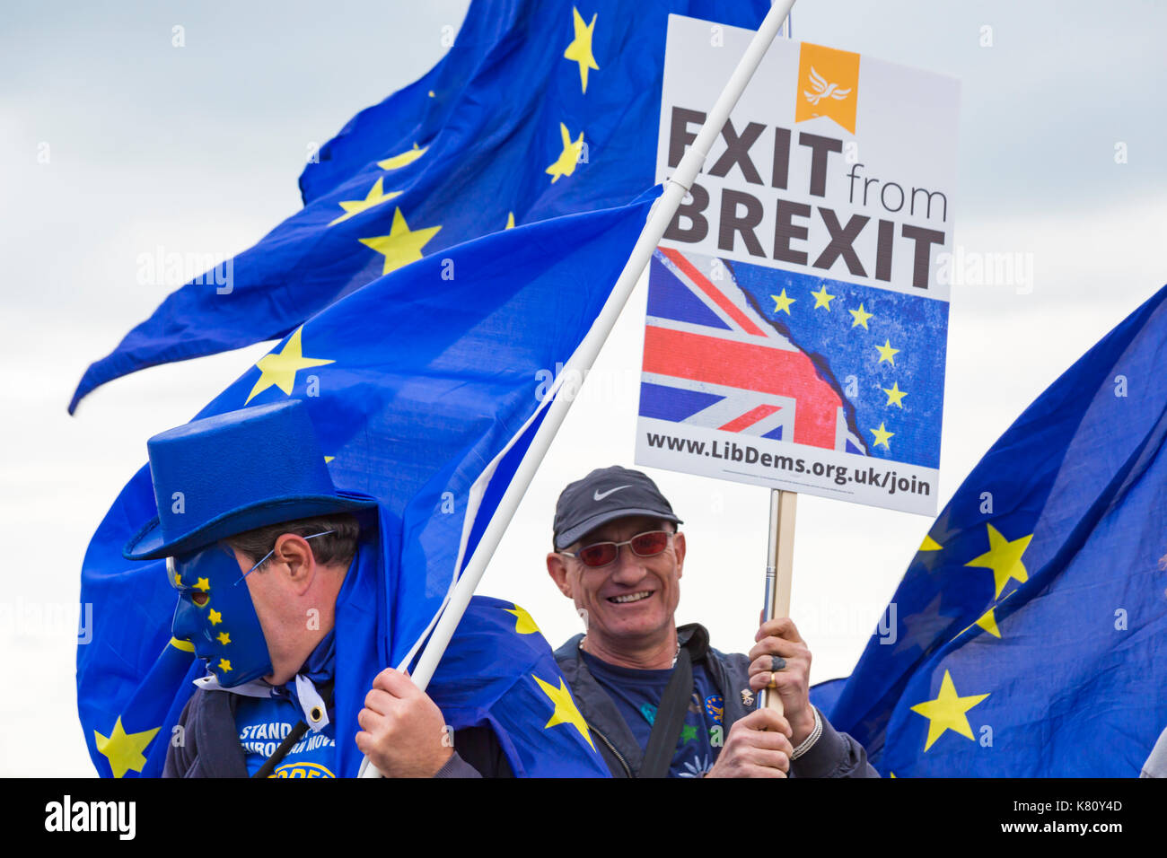 Eu supporters holding eu flags and exit from brexit placard hi-res ...