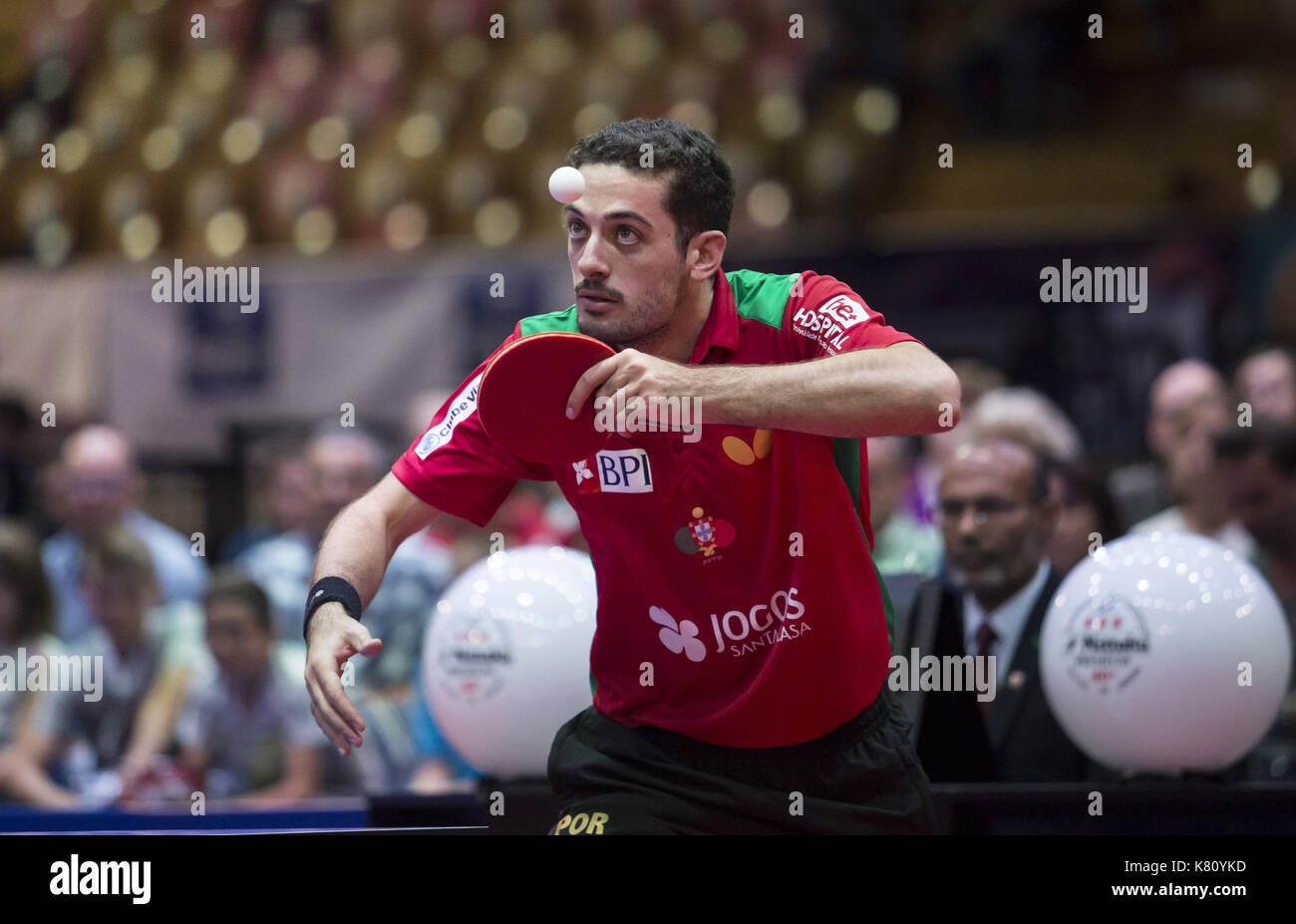 Portugal's Marcos Freitas serving against Germany's Boll in the men's ...