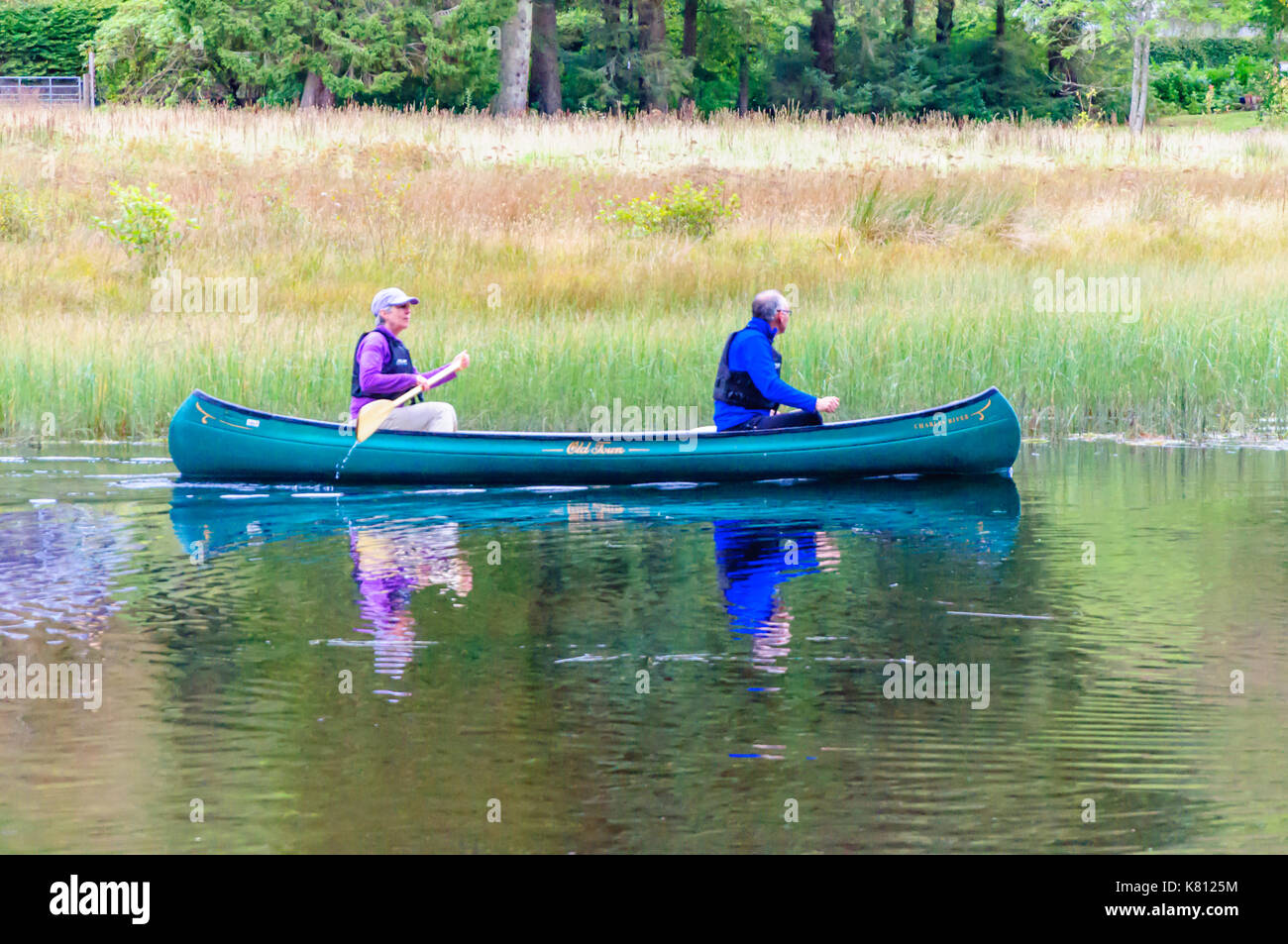 Loch Ard, Scotland, UK. 17th September, 2017. UK Weather: Two people ...