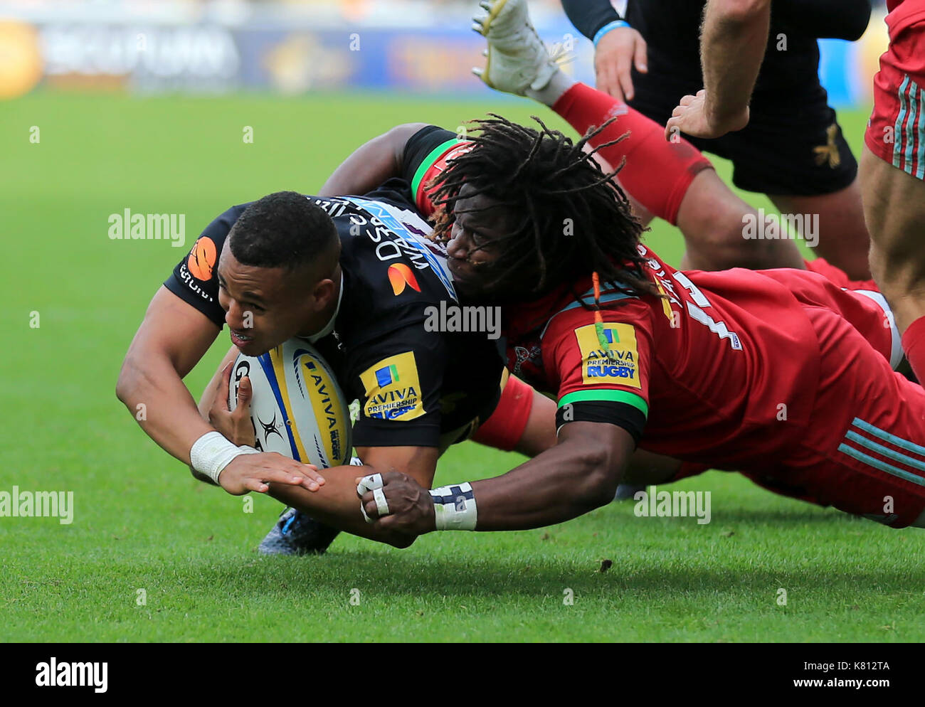 Wasps Marcus Watson tackled by Harlequins Marland Yarde during the ...