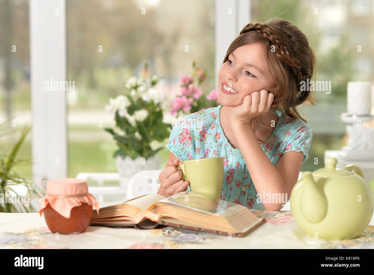 girl drinking tea Stock Photo - Alamy