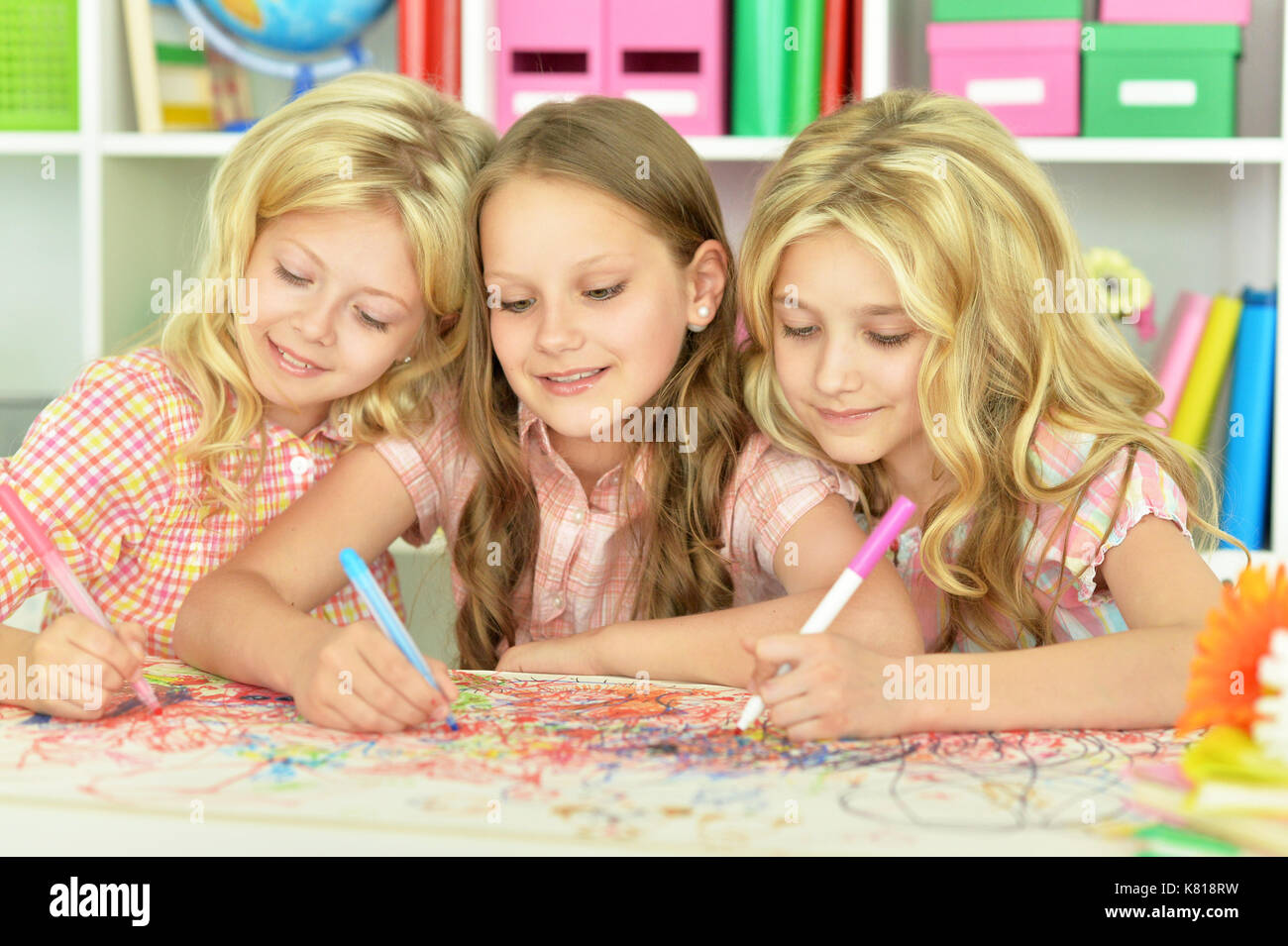 cute girls drawing with pencils Stock Photo - Alamy