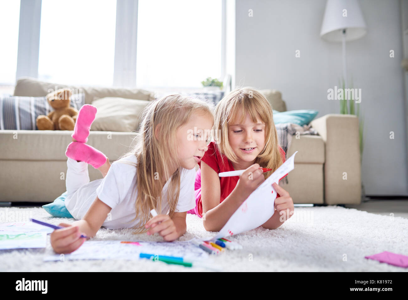 Little Friends Wrapped up in Drawing Stock Photo - Alamy