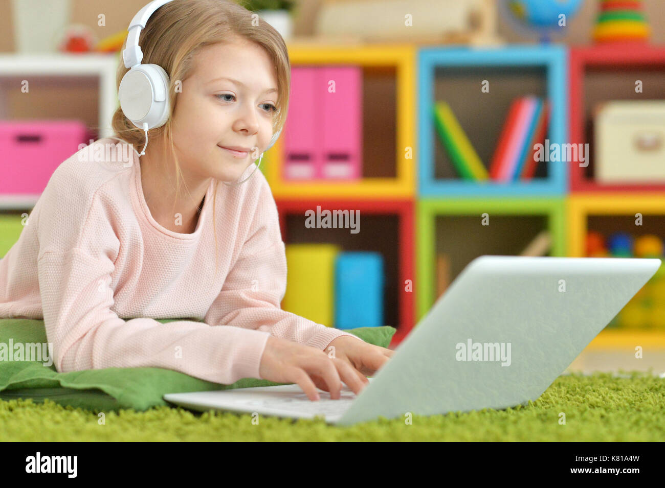 Cute baby girl laptop hi-res stock photography and images - Alamy