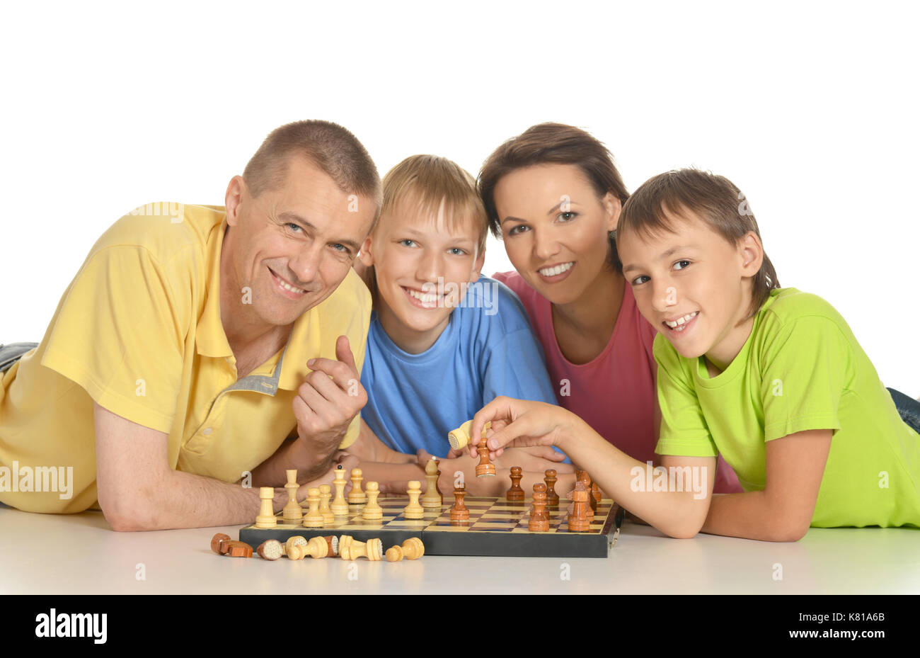 Family playing chess together hi-res stock photography and images - Alamy